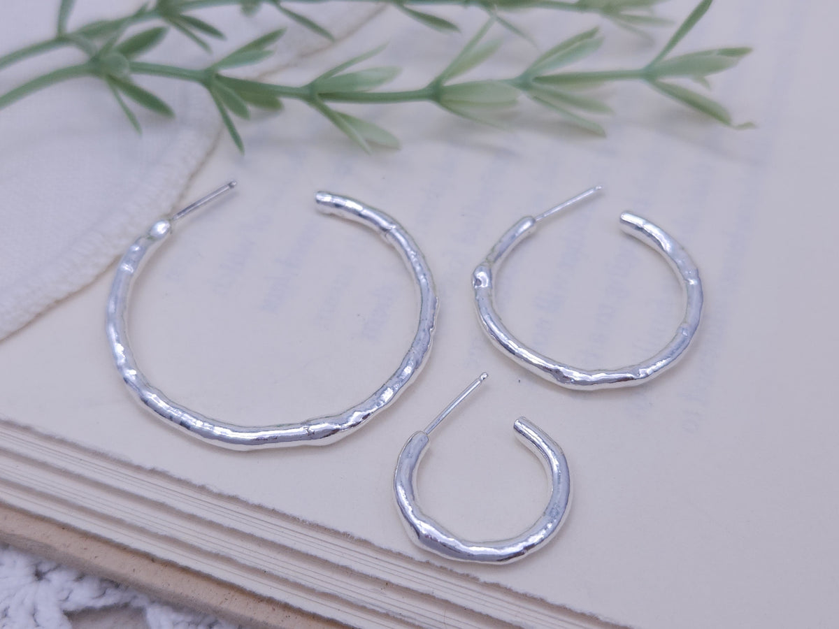 Sterling Silver Organic Textured Hoops – Crystal Lea Jewelry